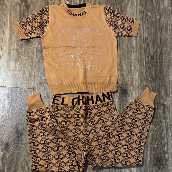 CHANEL | Pants & Jumpsuits | Chanel Tan And Black Logo Ankle Pants Top ...